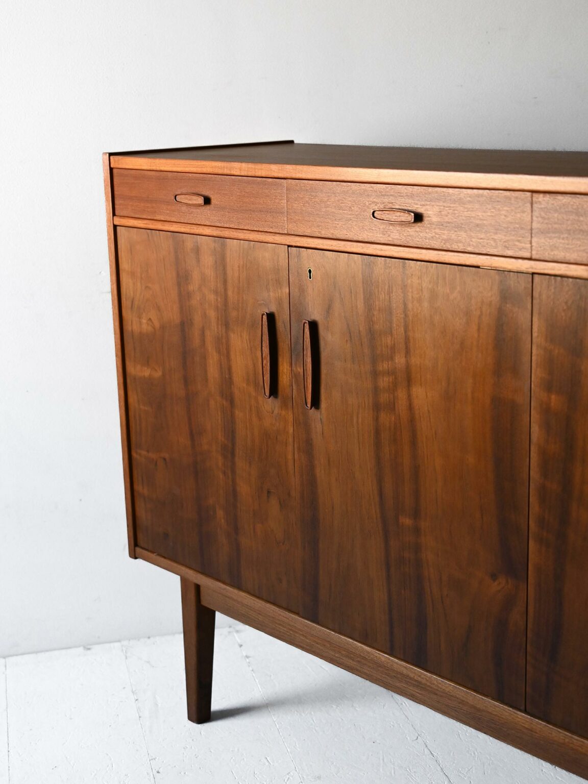 Scandinavian vintage teak highboard with four doors and drawers | Casafika