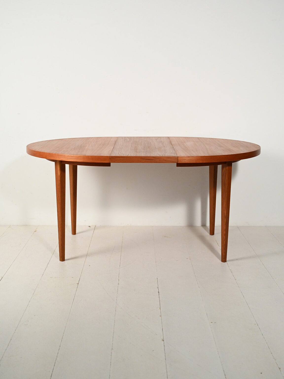 Scandinavian round extendable teak dining table | Casafika