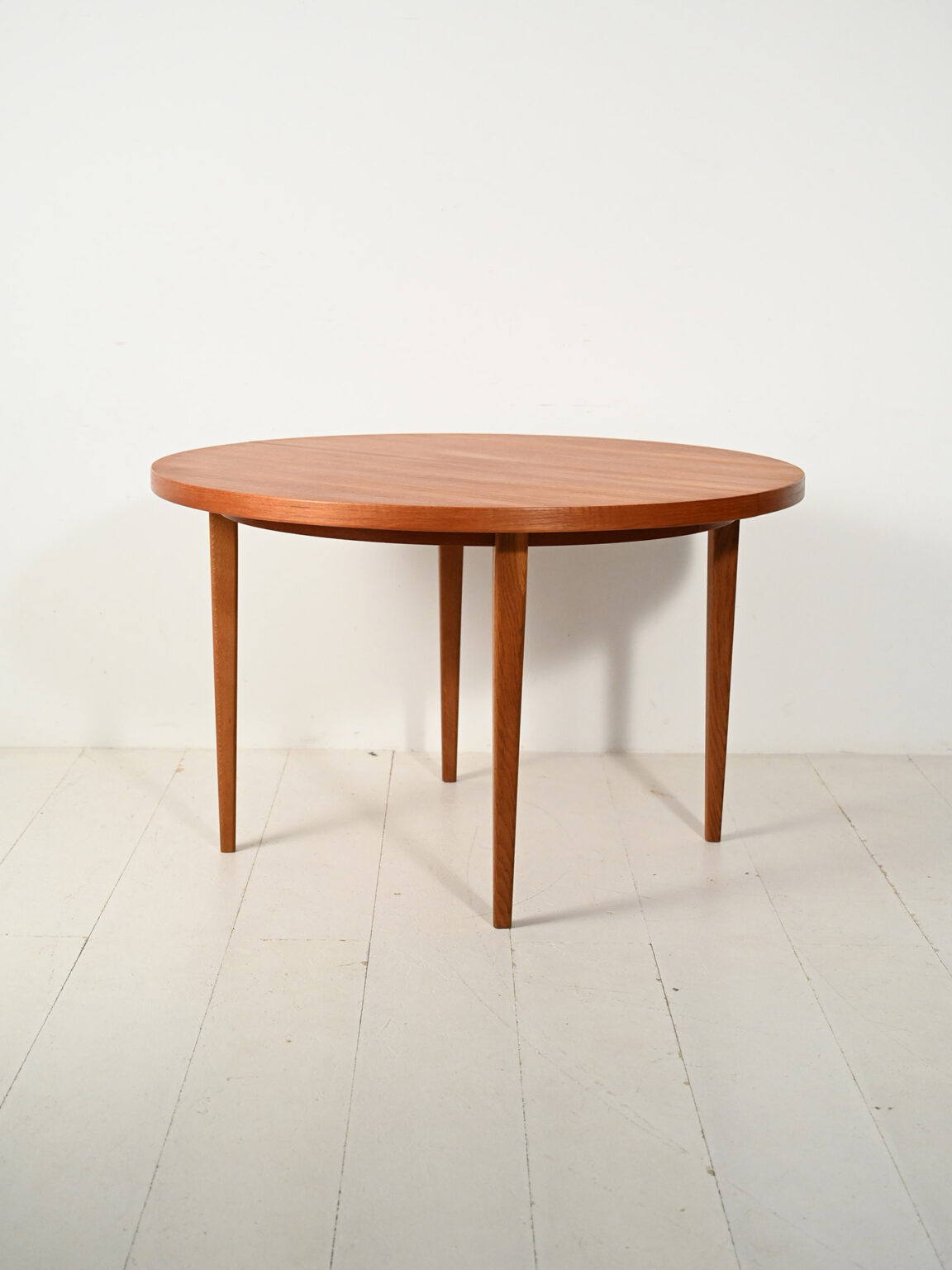 Scandinavian round extendable teak dining table | Casafika