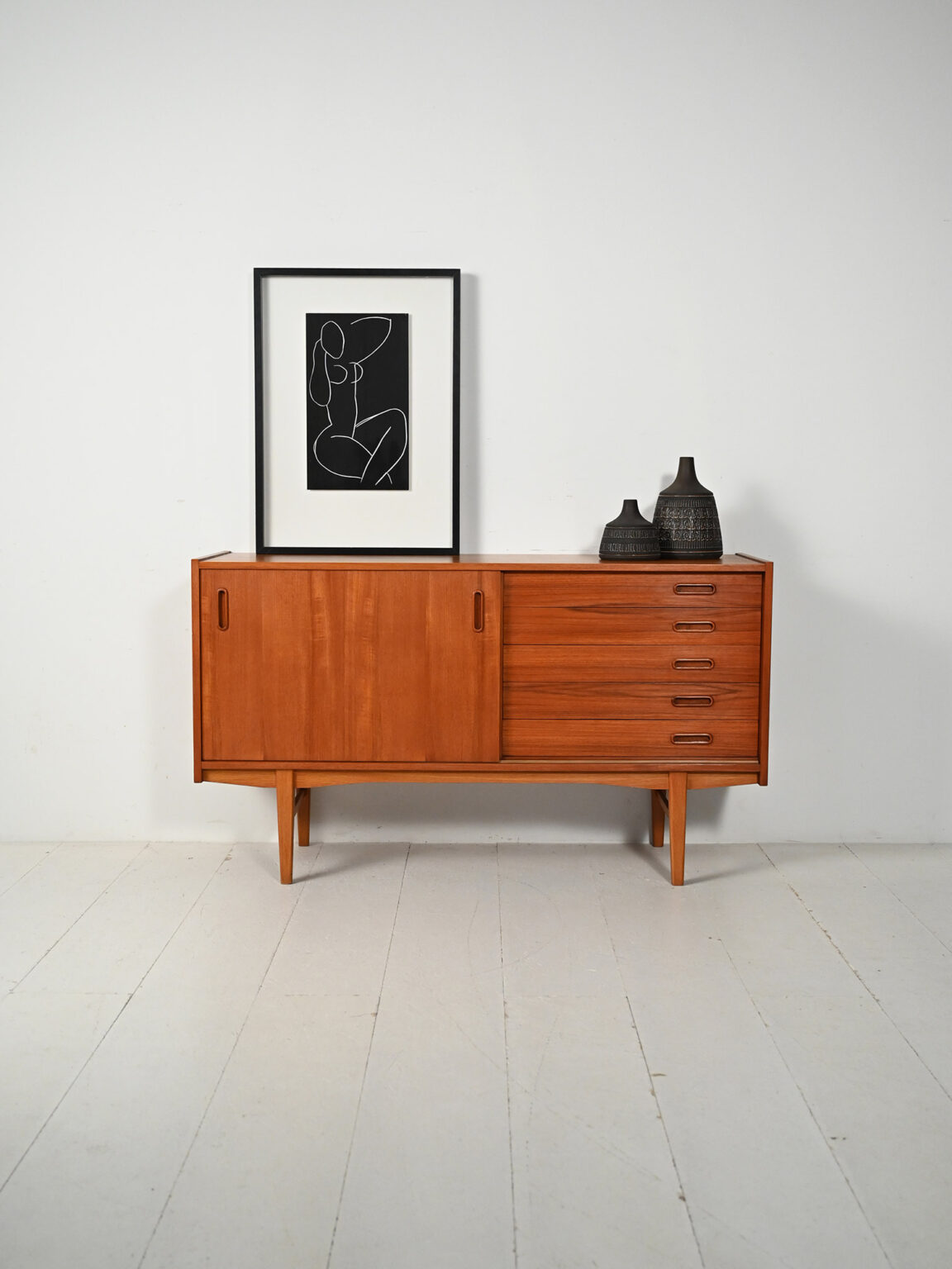 Scandinavian teak sideboard with recessed oval handles | Casafika