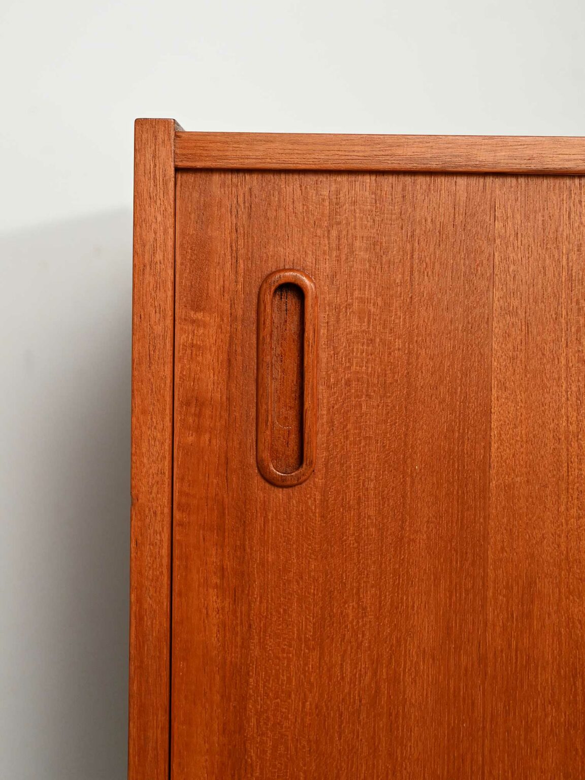 Scandinavian teak sideboard with recessed oval handles | Casafika