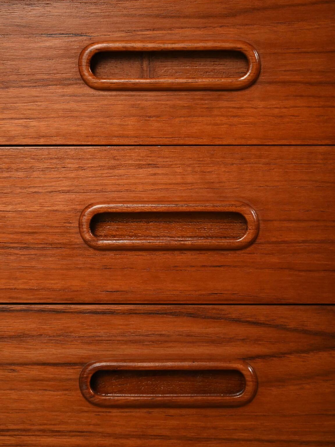 Scandinavian teak sideboard with recessed oval handles | Casafika
