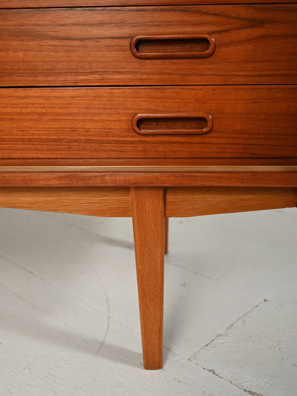 Scandinavian teak sideboard with recessed oval handles | Casafika