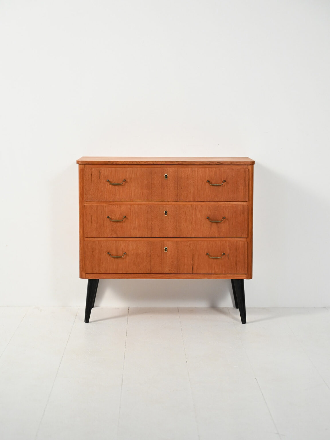 Scandinavian teak chest of drawers with black legs | Casafika